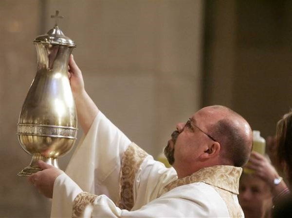 Sacramental oil blessed | The Blade
