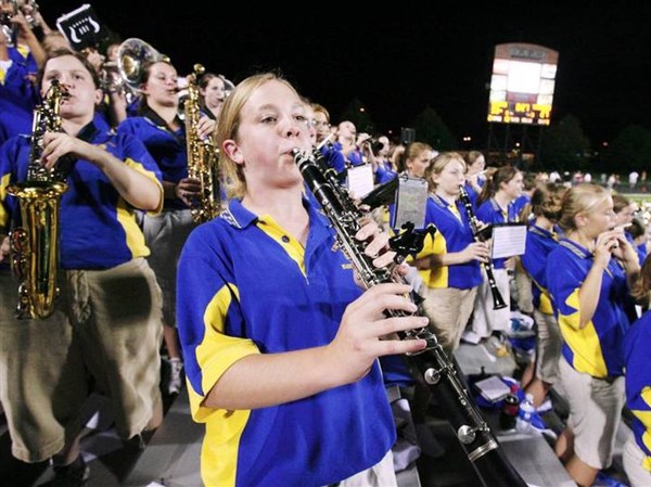 Game provides brief relief for Findlay players, band | The Blade