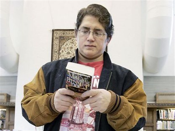 BUYING BOOKS AT THE WEST TOLEDO LIBRARY | The Blade