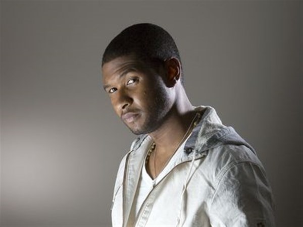 Usher transforms from player to parent on new CD | The Blade