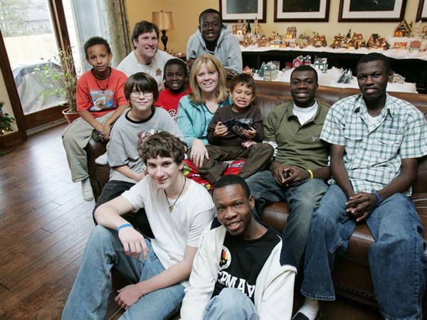 The 13 members of the Frisch family settle into their Extreme Makeover ...