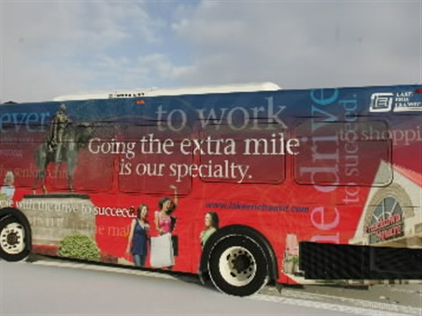 Colorful vinyl-wrapped bus wins advertising club award | The Blade