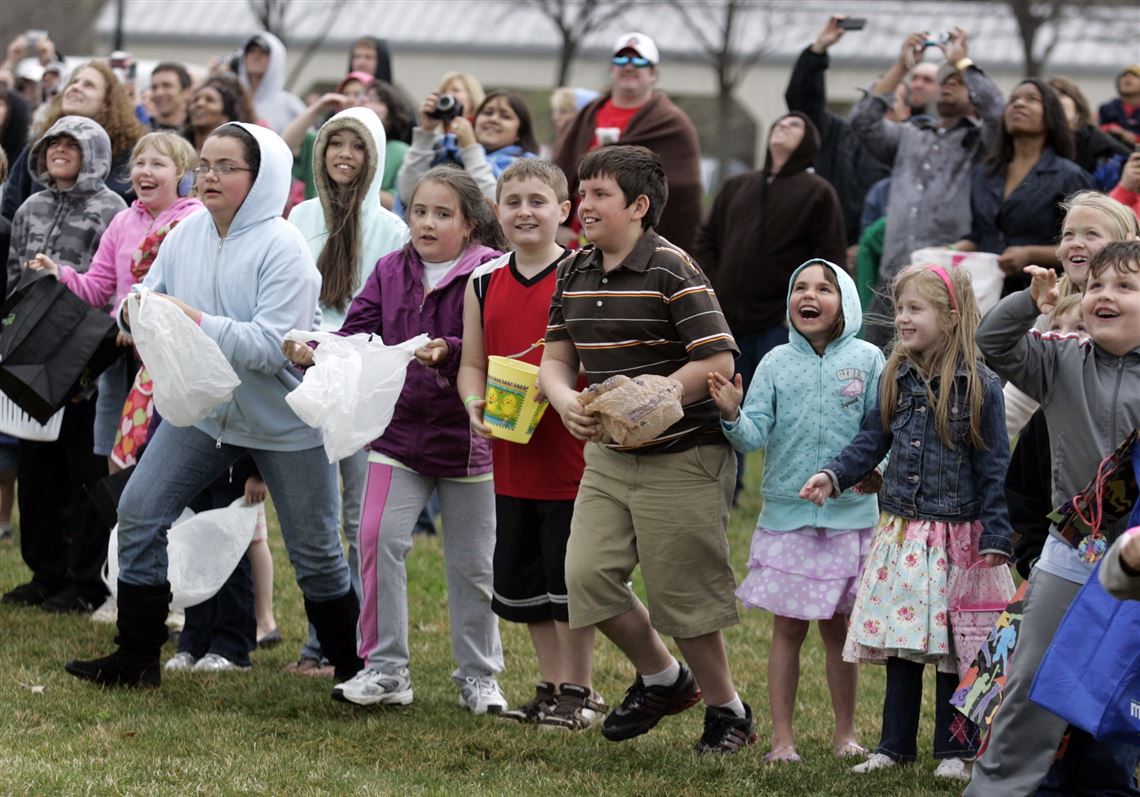 girl dropping easter eggs
