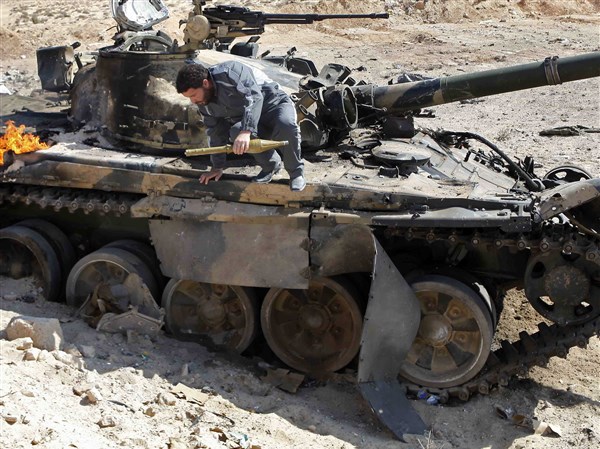 Airstrikes help Libyan rebels regain key city | The Blade