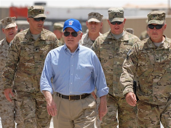 Defense chief Gates meets with U.S. troops in farewell tour of Afghan ...