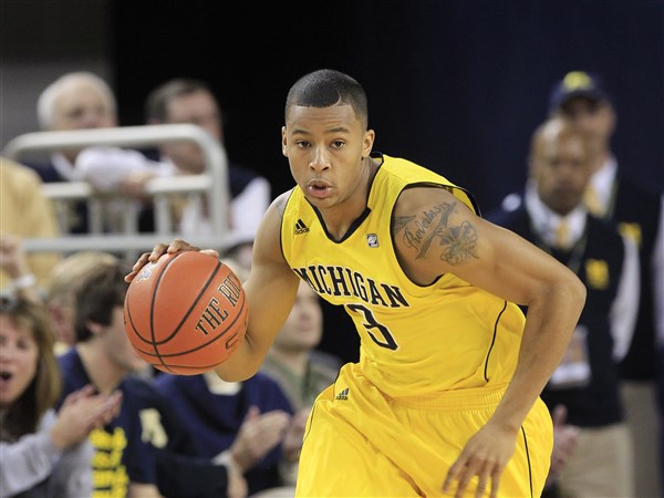 Burke decides to stay at Michigan | The Blade