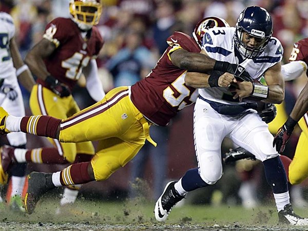 Seahawks take charge late to win as RG3 hurts knee | The Blade