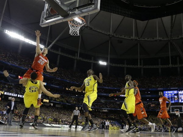 Michigan earns berth in title game with 61-56 win over Syracuse in ...