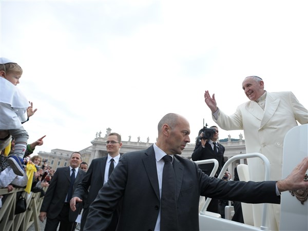 Francis kisses 'mini-me' pope as children in Carnival costumes flock to ...