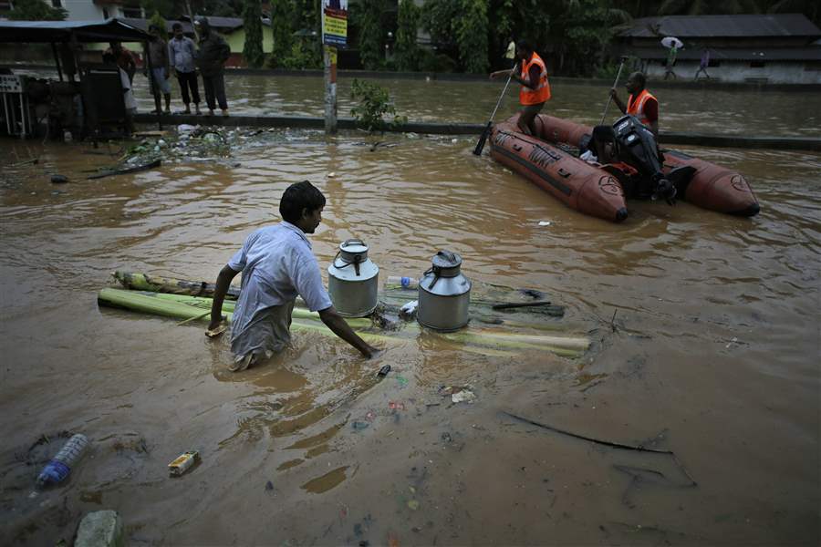 Monsoon flooding, mudslides kill 11 in India, maroon thousands - The Blade