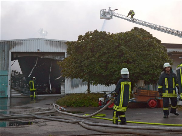 4 firefighters injured, 3 seriously, in explosions during blaze at ...