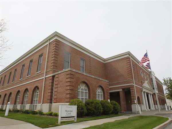 Toledoan whose convictions were undone sues Perrysburg, Perrysburg ...