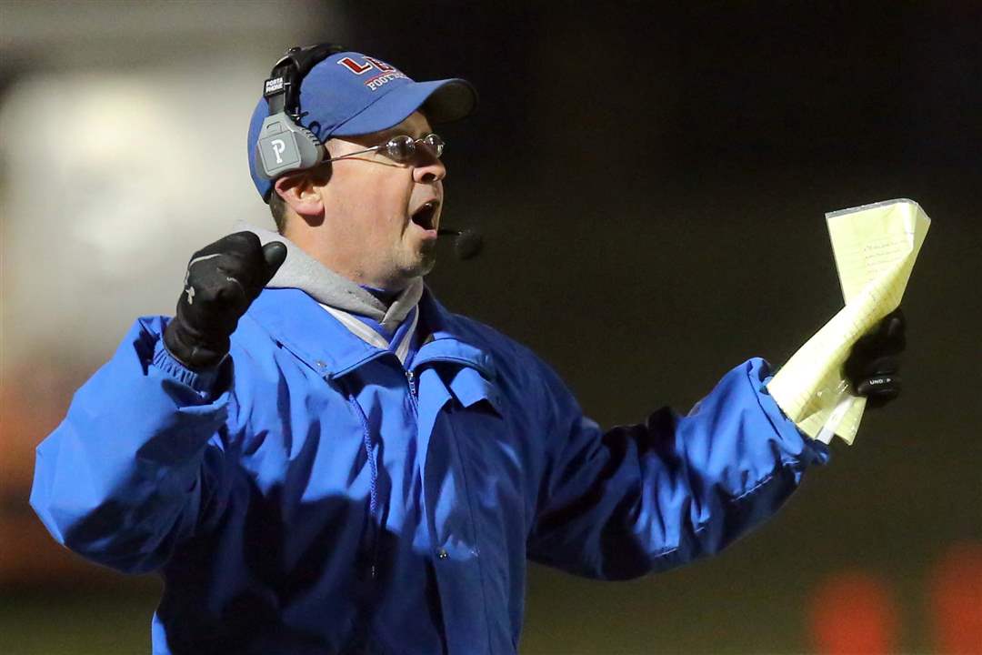 IN PICTURES: Eagles crush Spartans - The Blade