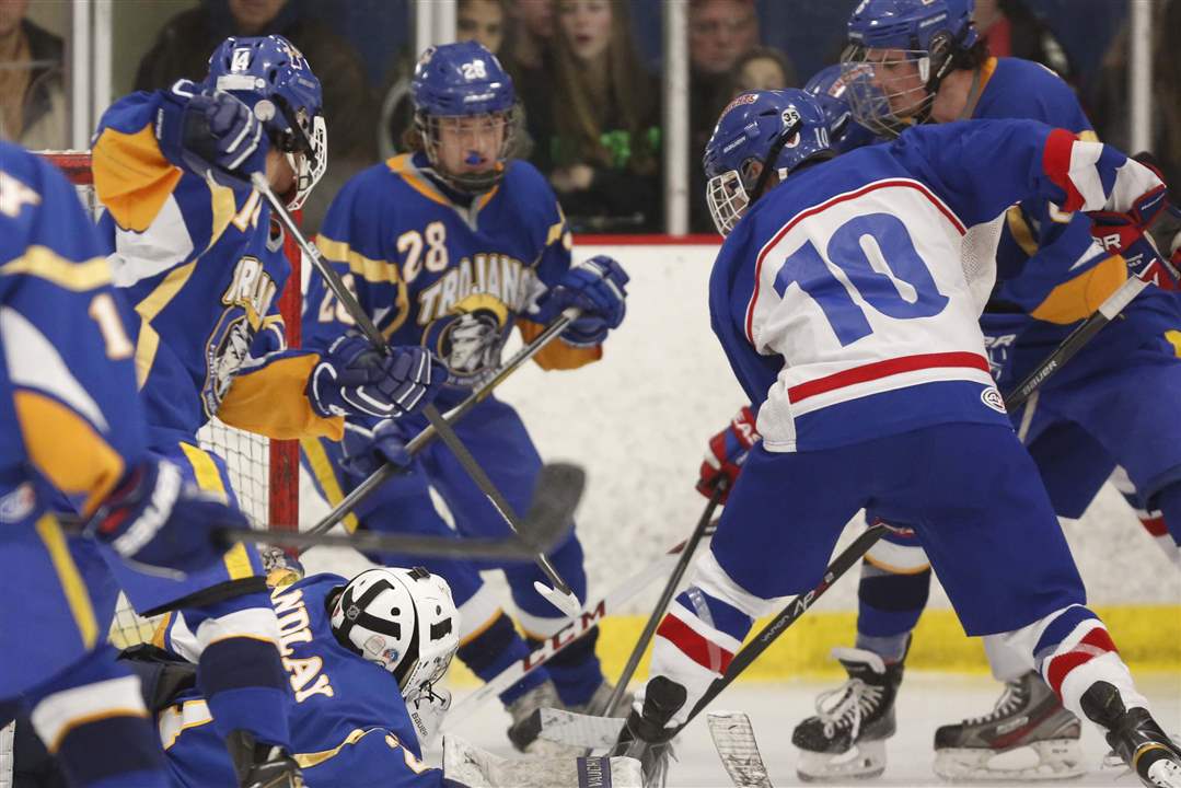 IN PICTURES: St. Francis wins district - The Blade