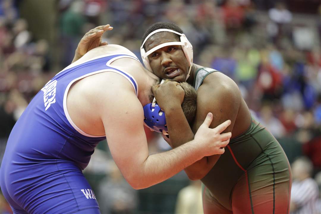 IN PICTURES: 1st round of state wrestling - The Blade