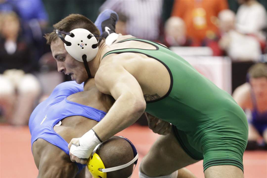 IN PICTURES: 1st round of state wrestling - The Blade