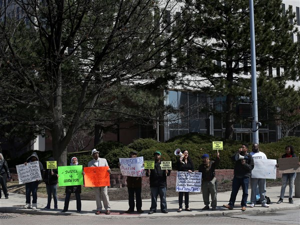 Dozen protest Toledo police conduct | The Blade