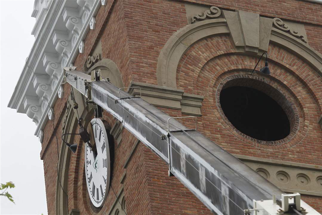 Renovated dials installed in Fulton County Courthouse clock tower - The ...