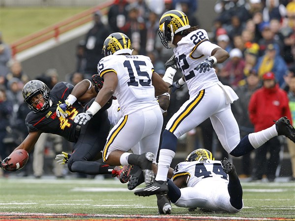 Wolverines win with defense | The Blade