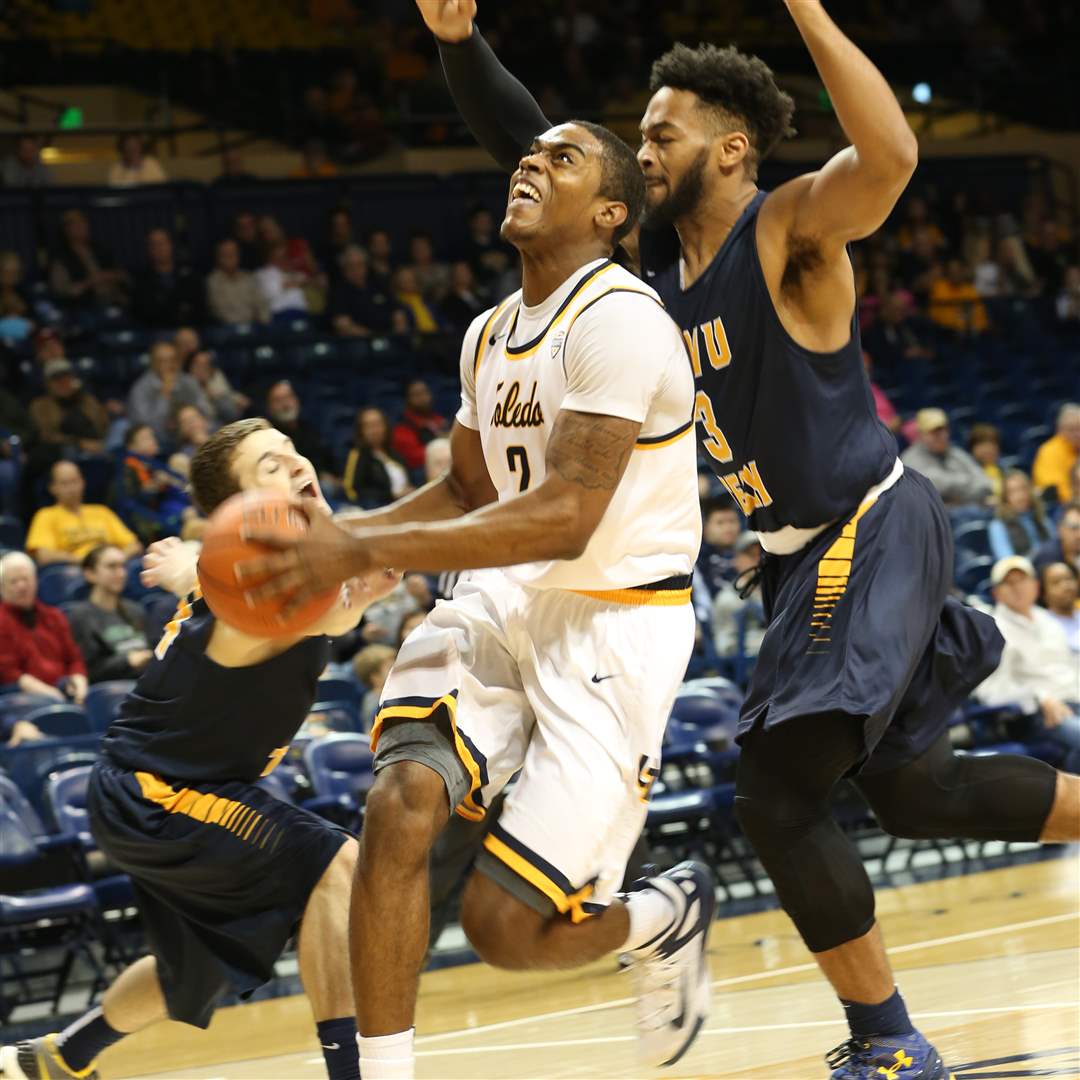 IN PICTURES: UT men's basketball wins opener - The Blade