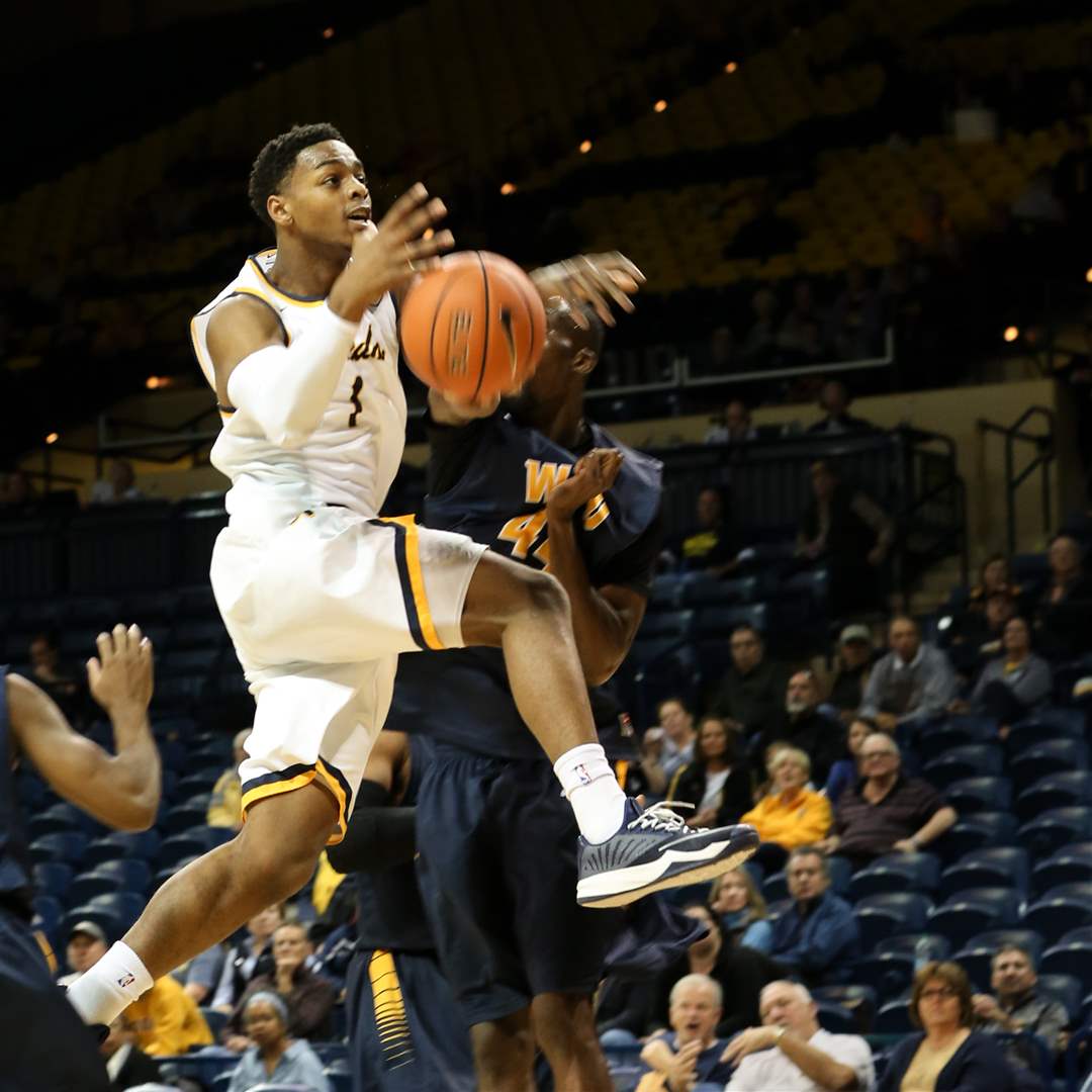 IN PICTURES: UT men's basketball wins opener - The Blade