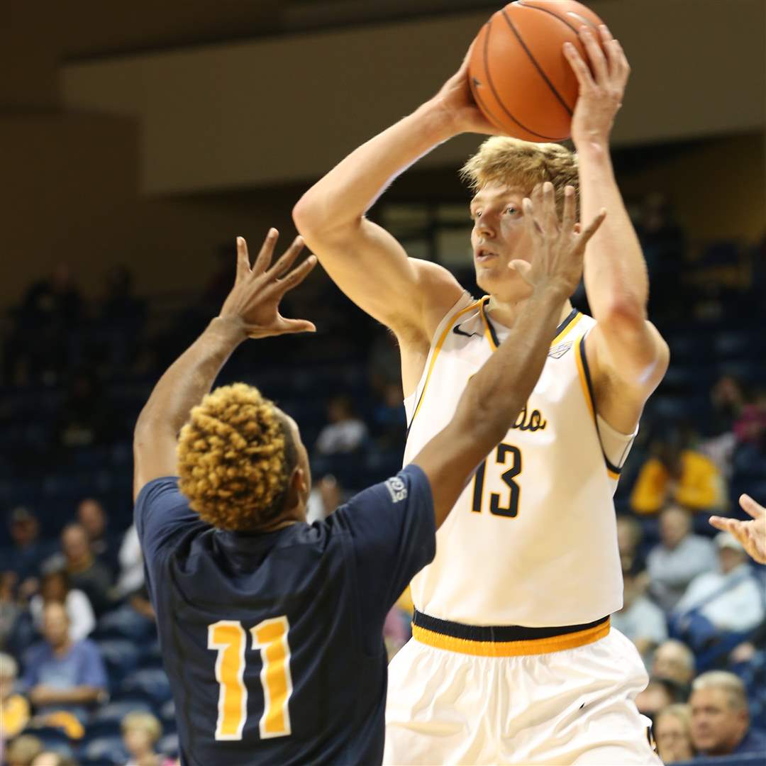 IN PICTURES: UT men's basketball wins opener - The Blade