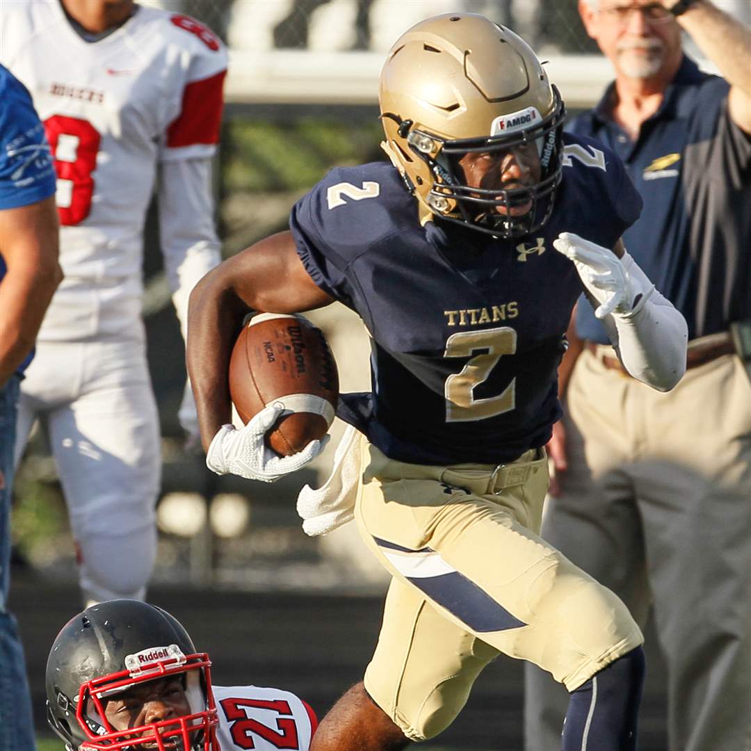 IN PICTURES: St. John's 44, Rogers 0 - The Blade