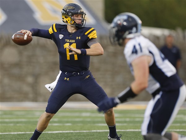 Woodside throws 4 TD passes as UT rolls | The Blade