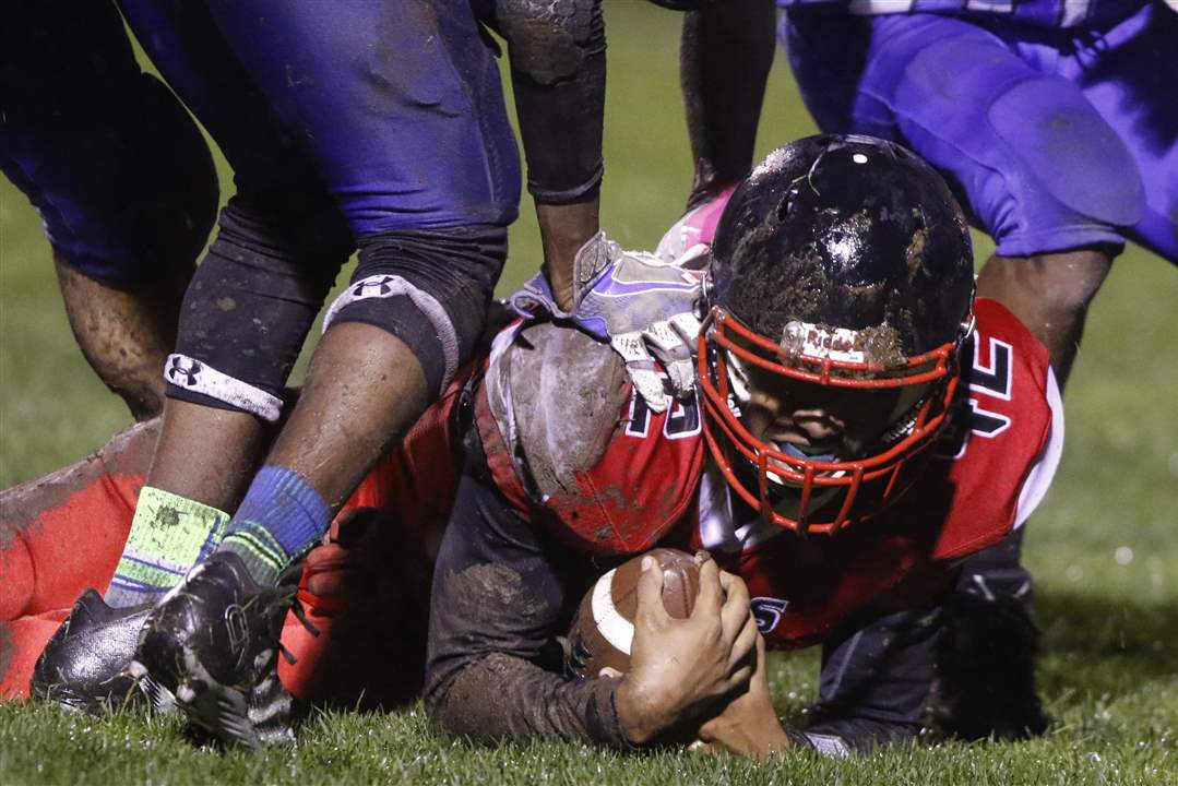 IN PICTURES: Woodward 34, Rogers 0 - The Blade