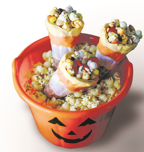 Sweet and salty combine in candy corn snack mix cones - The Blade