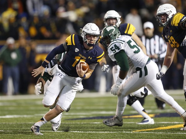 Woodside breaks UT mark for TD passes in a season | The Blade