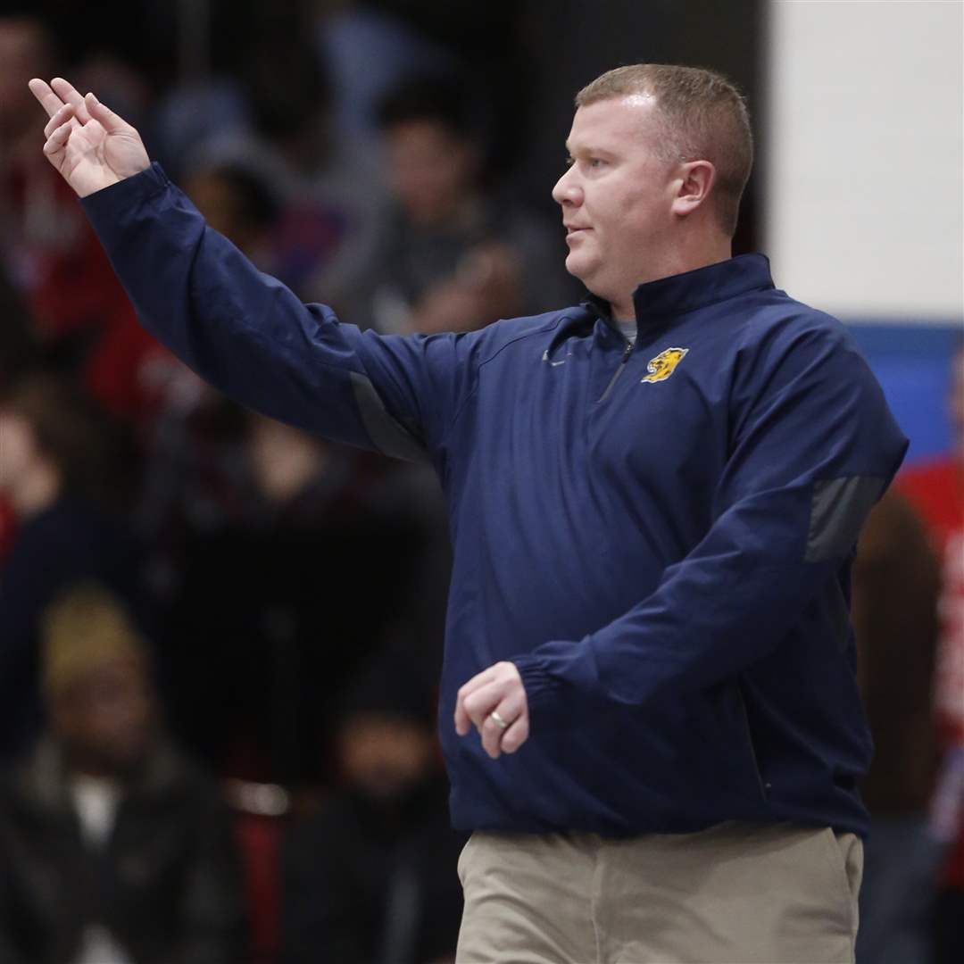 IN PICTURES: St. Francis 64, Whitmer 53 - The Blade