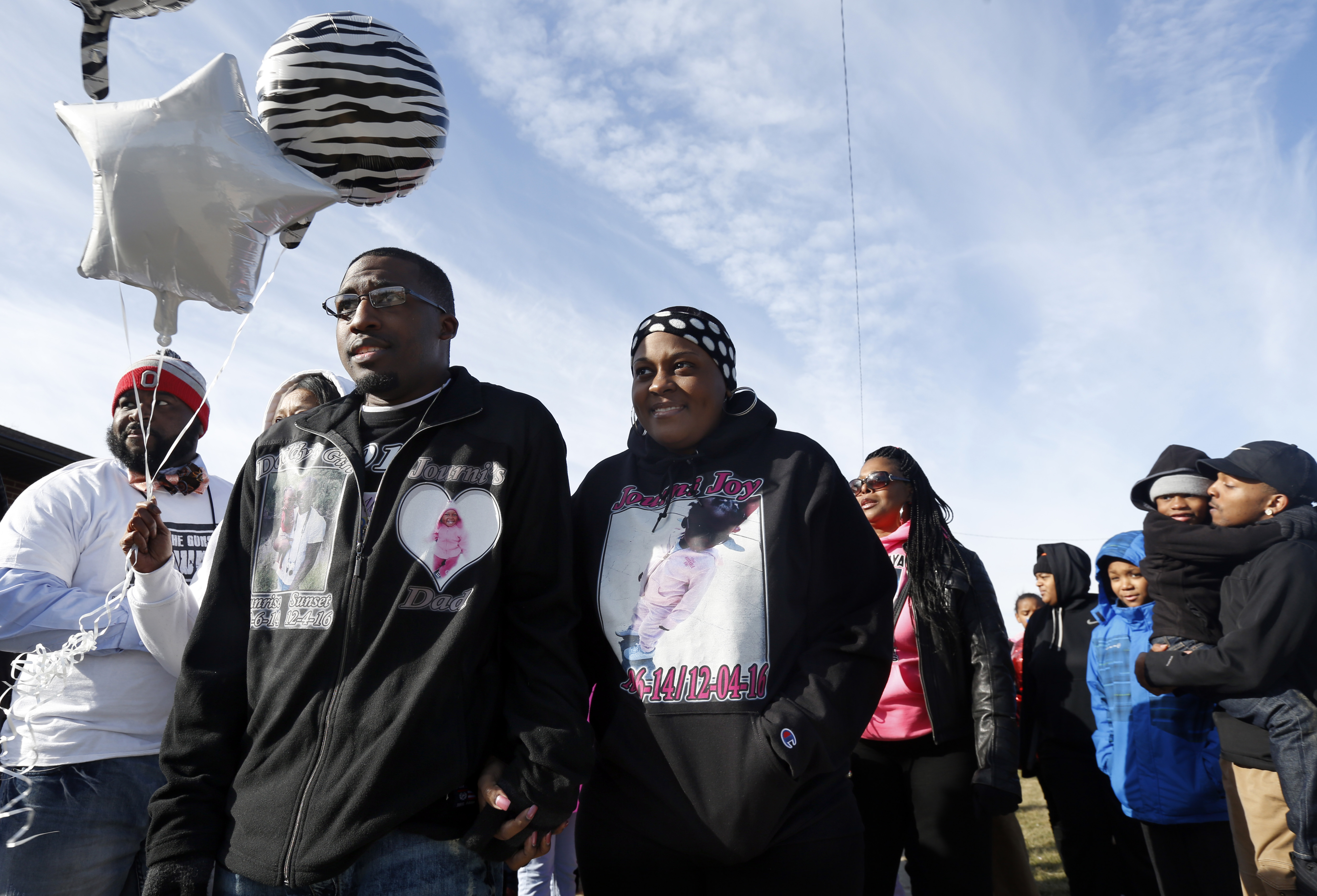 Parents of slain 2-year-old march in her honor, urge use of gun locks ...