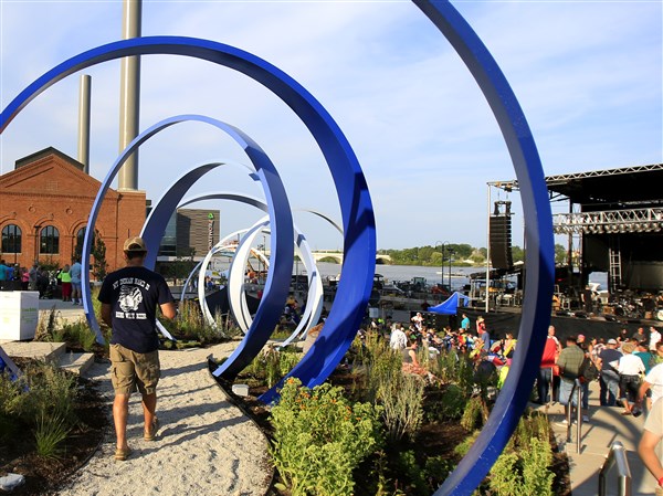 Gaining Momentum: New downtown park ushers in arts and music festival ...