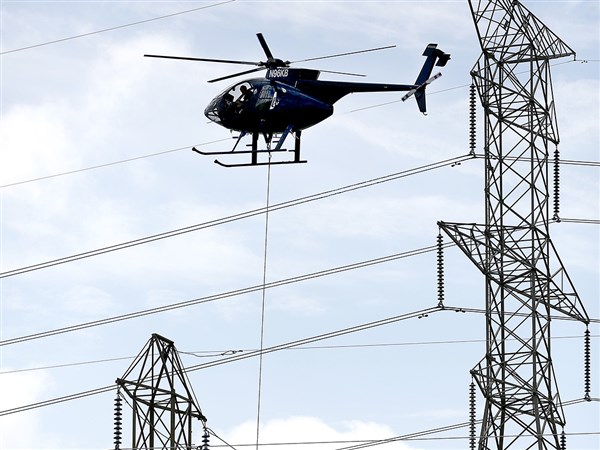 High-wire work near Dunbridge | The Blade