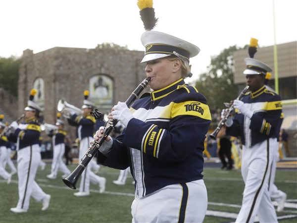GALLERY: Retired cop takes field as UT band member | The Blade