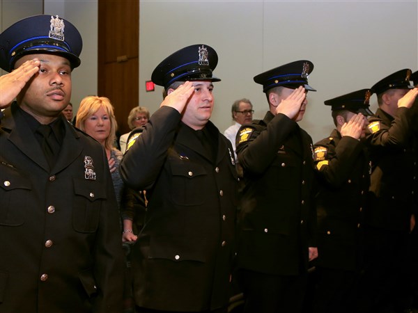 Six Toledo police officers earn promotions | The Blade