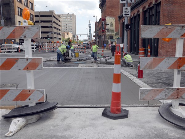 Downtown Toledo construction faces new roadblock — rain | The Blade