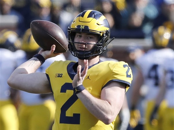 Michigan quarterbacks locking in mentally to new offense | The Blade