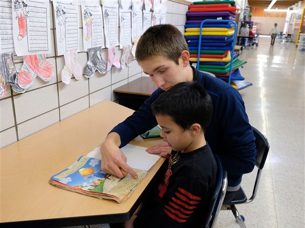 Both sides benefit from peer tutoring program in area schools | The Blade