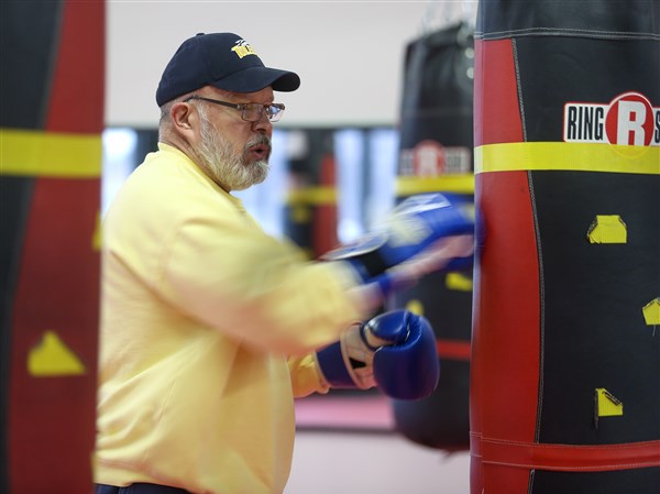 Toledoans 'beating' Parkinson's through local boxing program | The Blade
