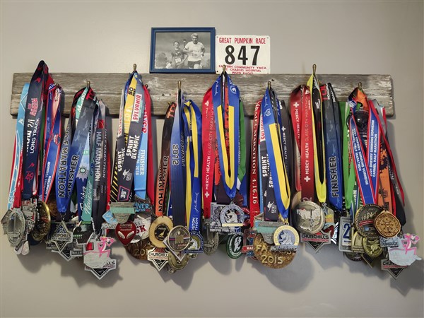 Heavy medal: What do seasoned runners do with all that hardware? | The ...