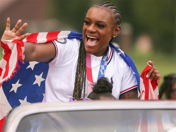 Photo Gallery: City throws celebration parade for Olympian Oshae Jones ...