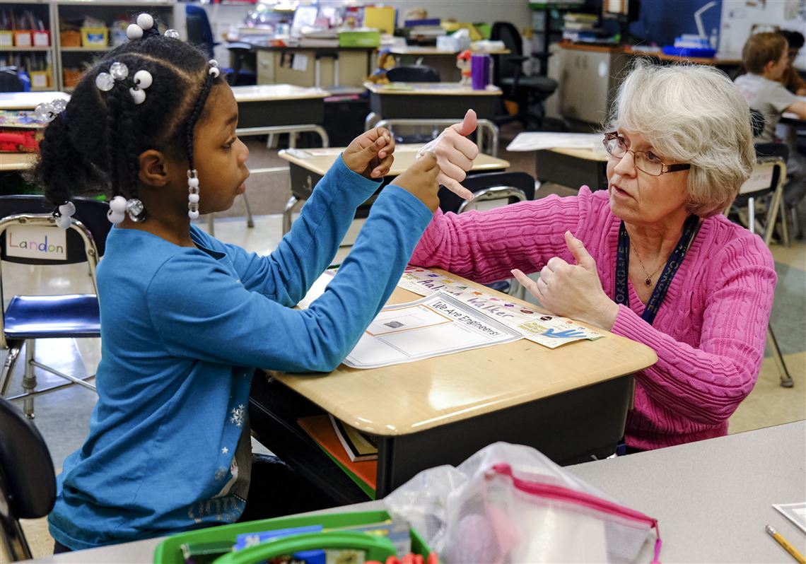 Students Using Sign Language