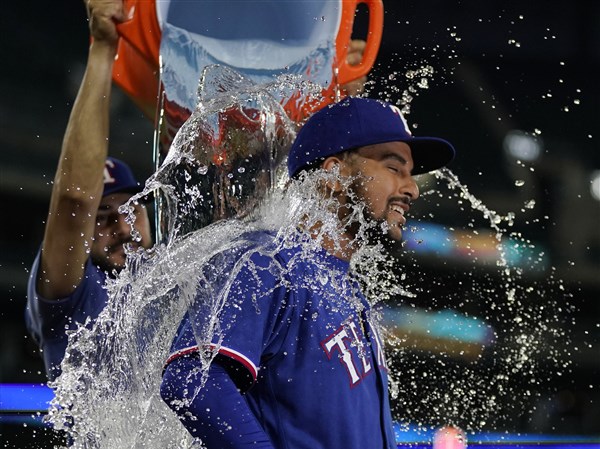 Jung homers, Heim drives in 4 to help Rangers outscore Tigers 10-6 ...