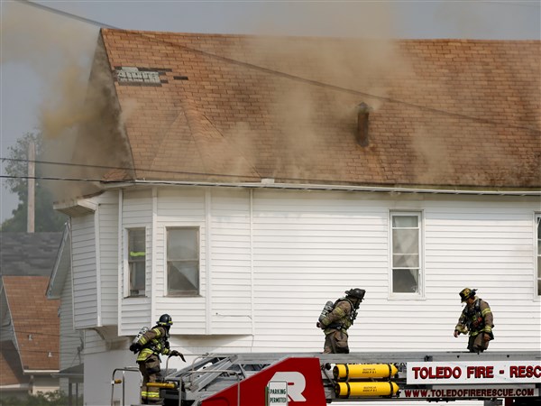Photo Gallery: TFRD battles residential fire in East Toledo | The Blade