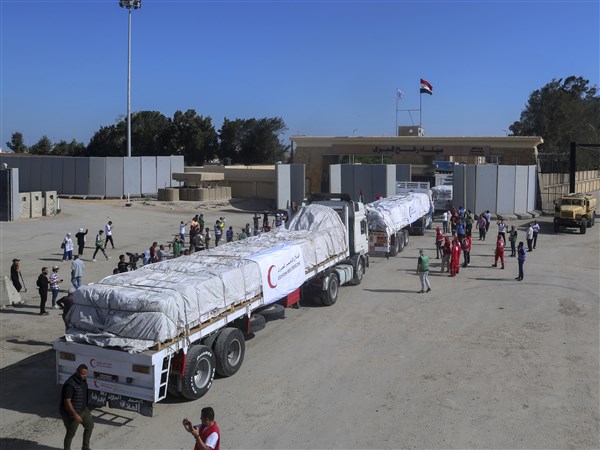 Egypt's border crossing opens to let a trickle of needed aid into Gaza ...