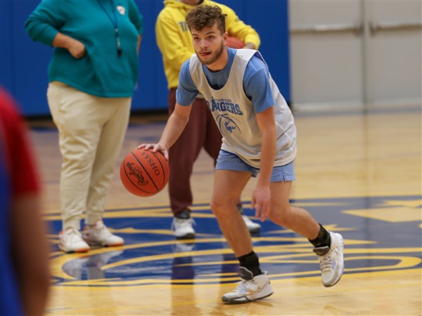 Long road back: Northwood's Cluckey returns to basketball court after ...