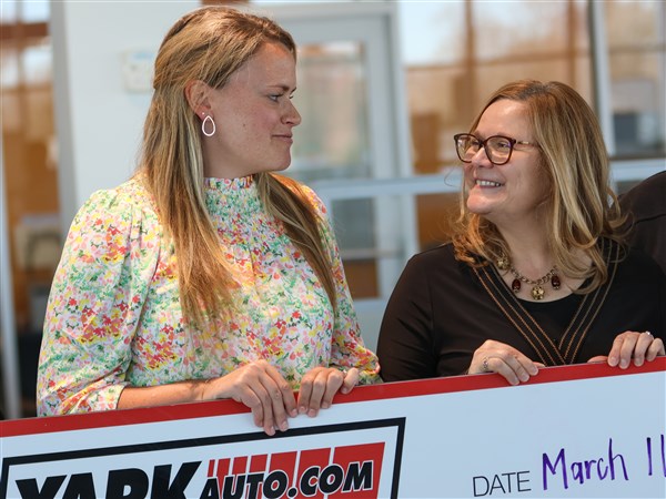 Yark auto donates thousands of dollars to nonprofit helping residents ...