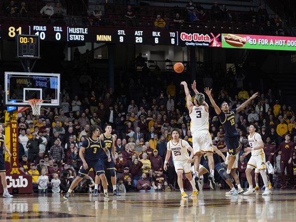 Garcia beats buzzer with long 3-pointer to lift Minnesota past No. 20 ...